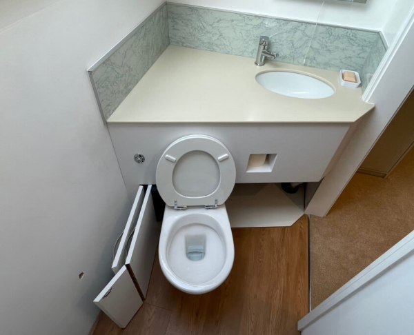 Retractable toilet for small utility room ideas 2025 - Hidealoo